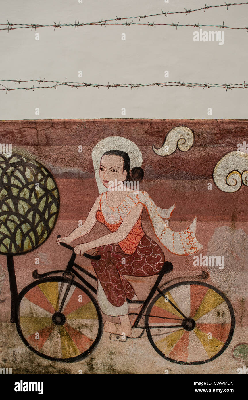 Mae Sot, close to the Burma border. Graffiti on the wall, done by ...