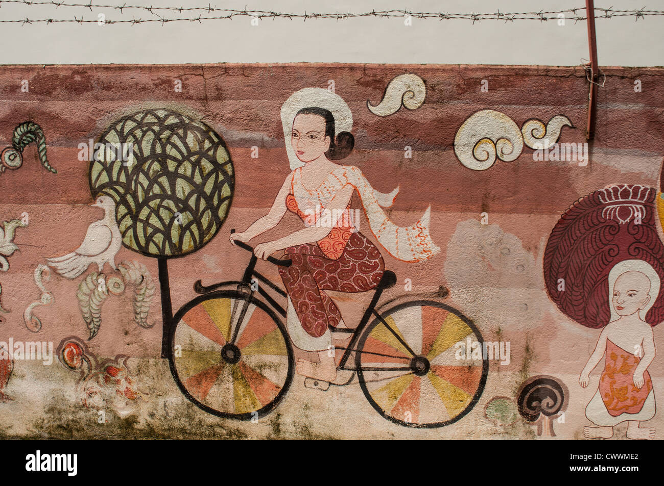 Mae Sot, close to the Burma border. Graffiti on the wall, done by ...