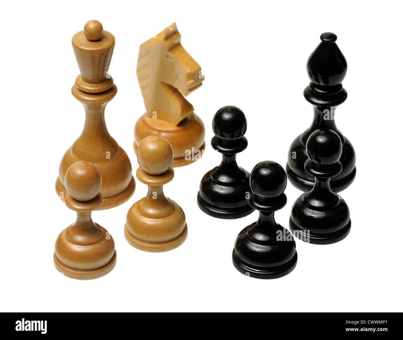 Several wooden chess pieces light and dark colors Stock Photo - Alamy