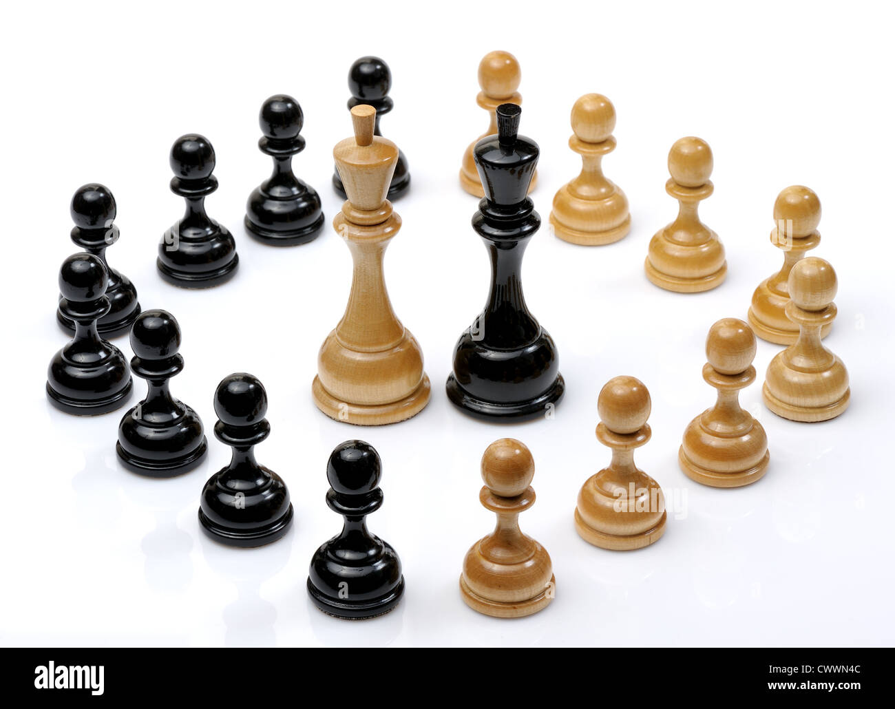 Several wooden chess pieces light and dark colors Stock Photo - Alamy