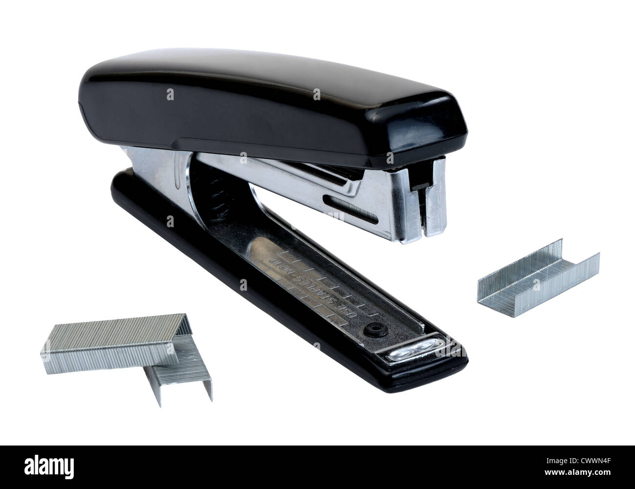 Black stapler and staples to him, isolated Stock Photo - Alamy