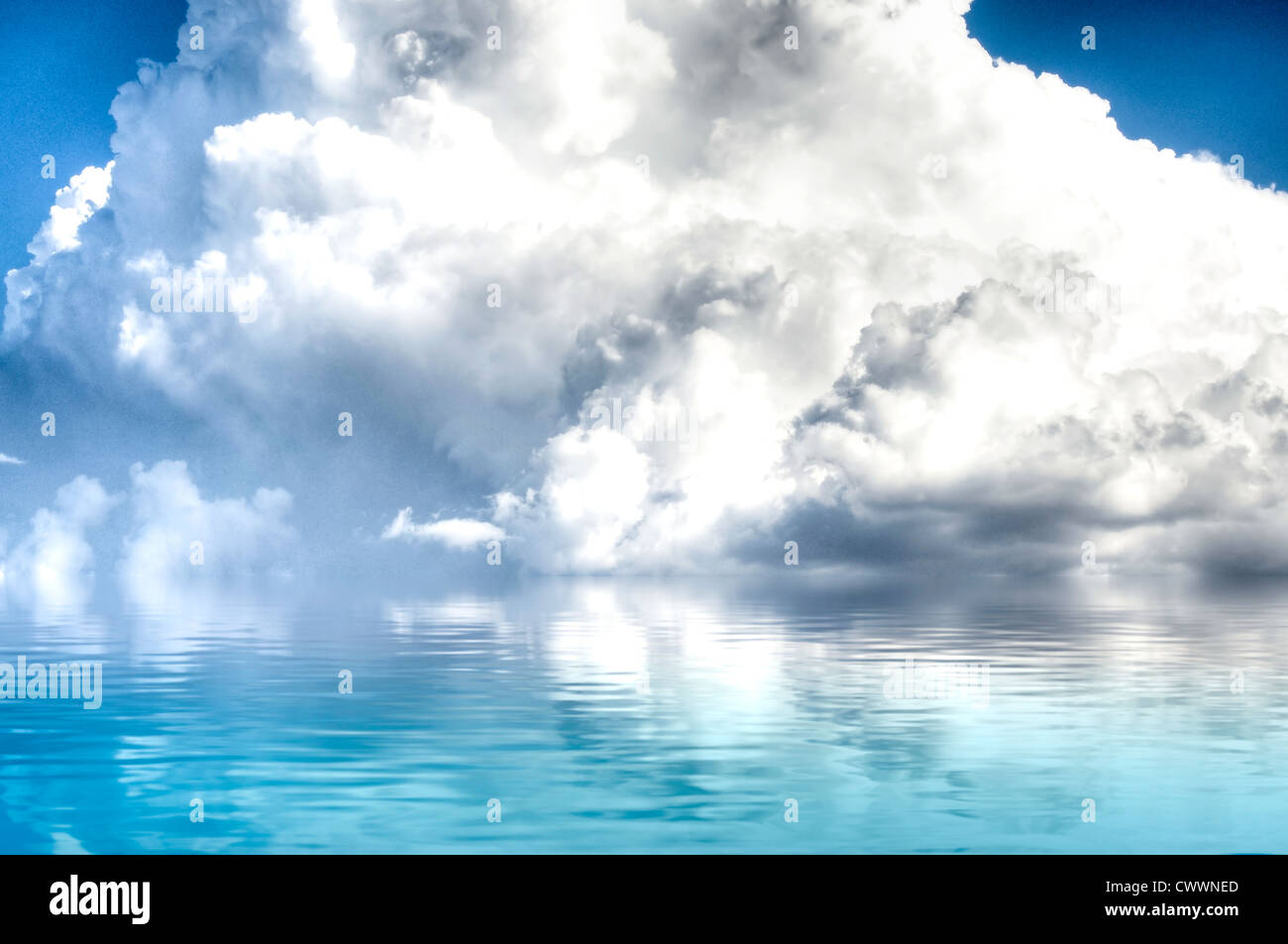 Storm with water reflection. A sky of clouds reflected in a calm sea ...