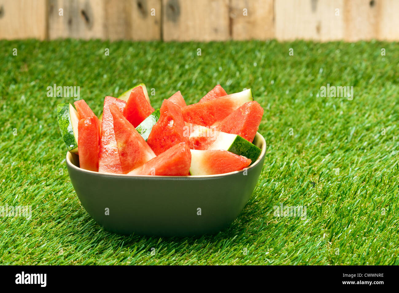 Bowl of cut watermelon slices in nice summer colors Stock Photo - Alamy