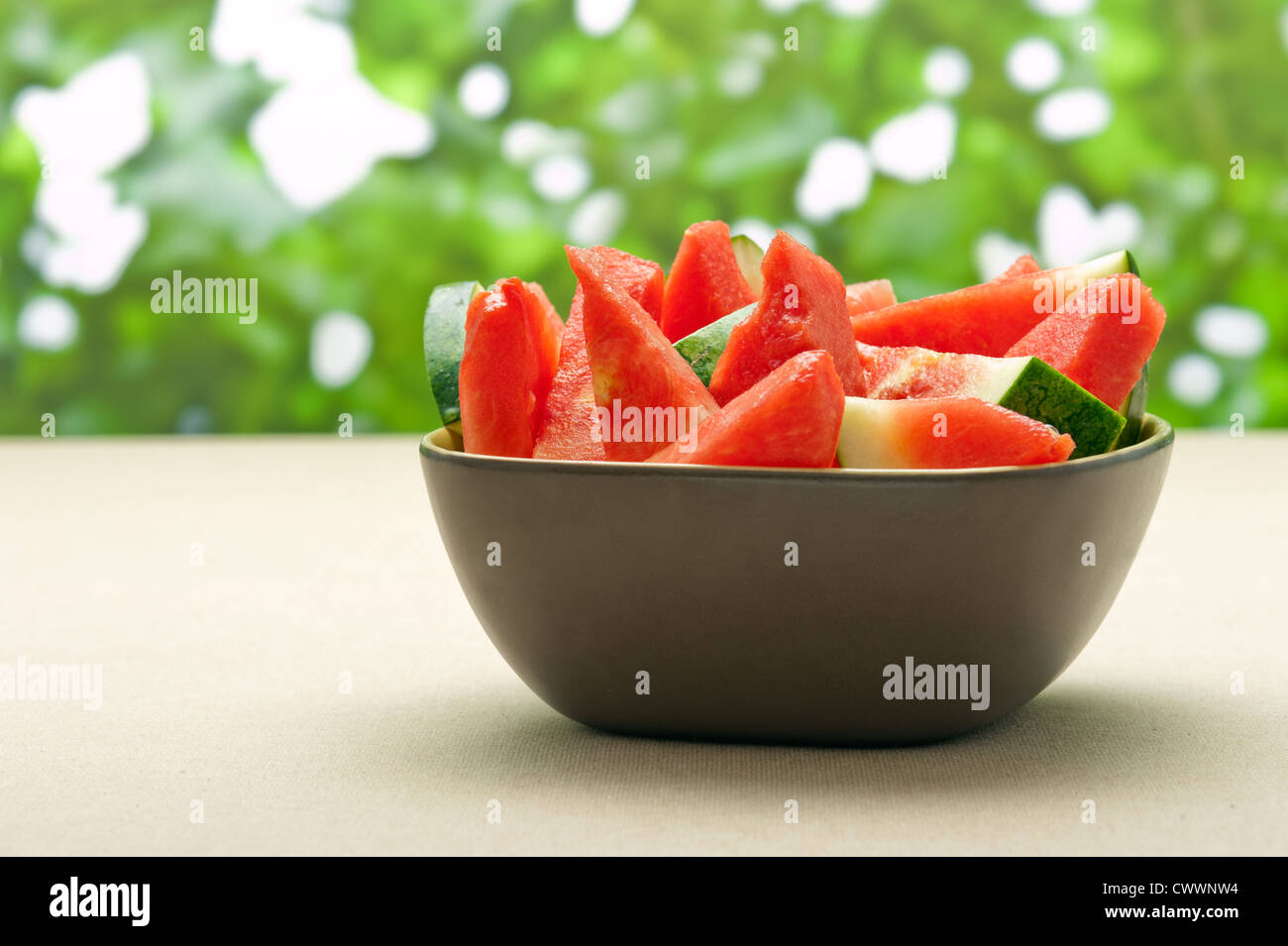 Bowl of cut watermelon slices in nice summer colors Stock Photo - Alamy