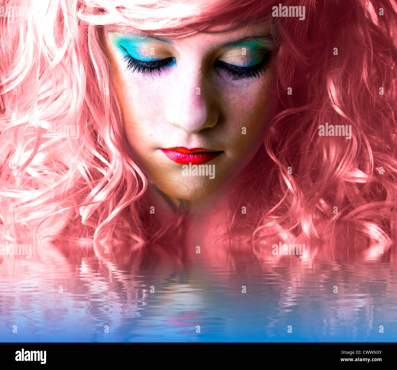 pink haired fairy girl in water reflection Stock Photo - Alamy