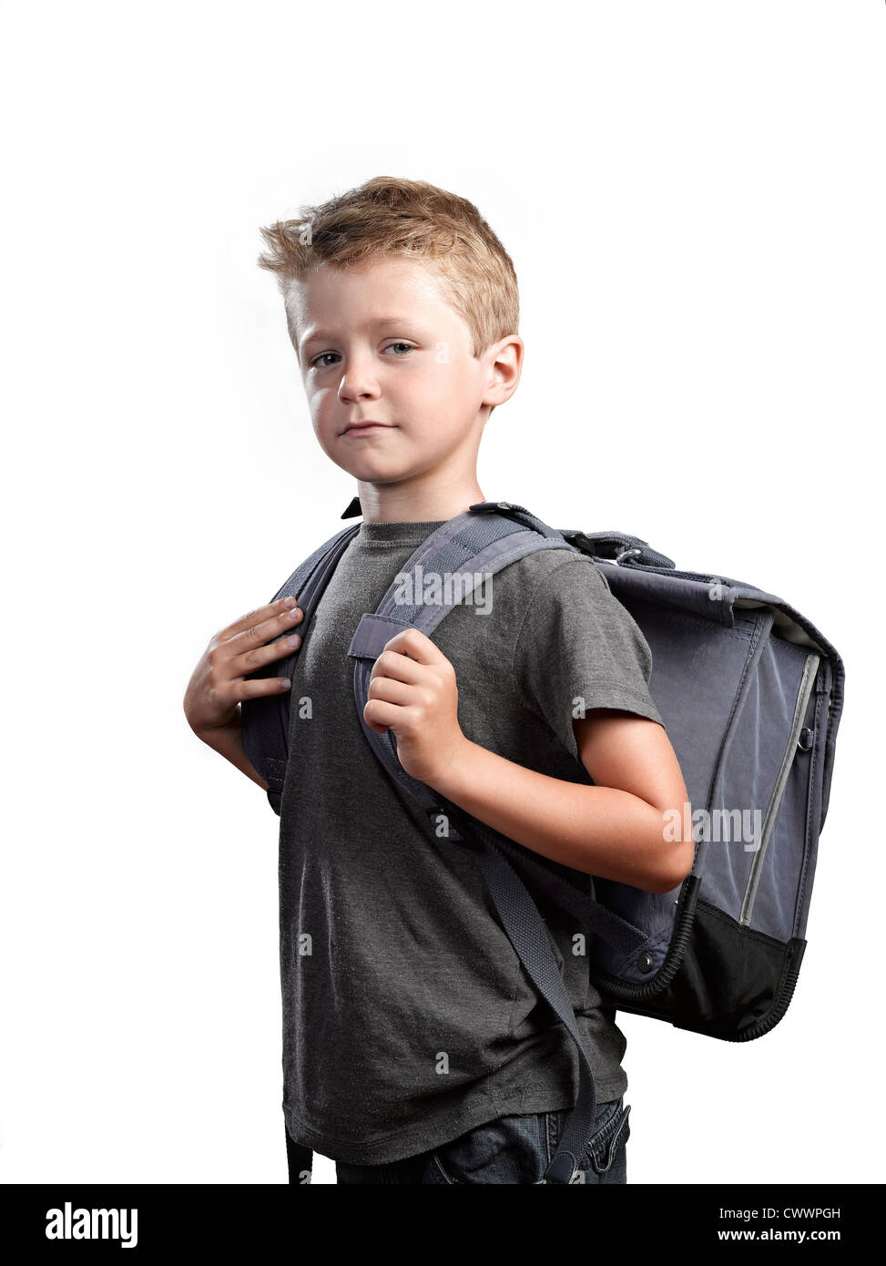 Young boy with backpack isolated on white background Stock Photo - Alamy