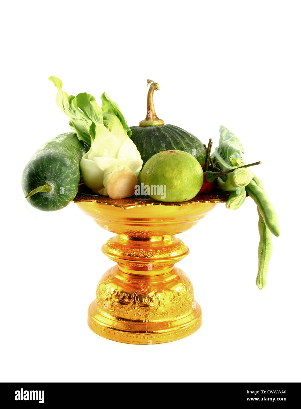 Vegetables mix on golden tray on white background Stock Photo - Alamy
