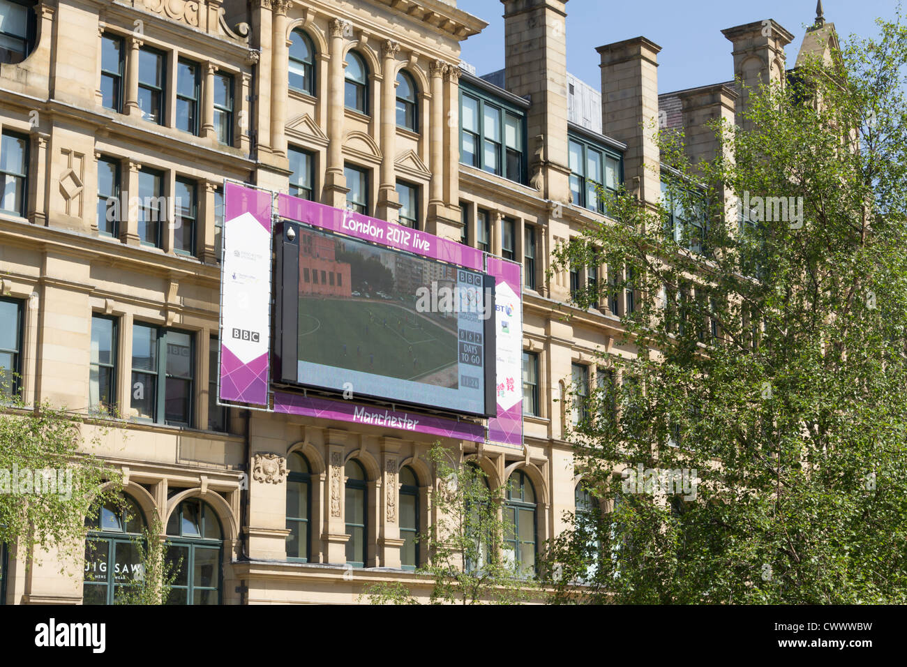Giant TV screen mounted on Manchester's Corn Exchange building in ...
