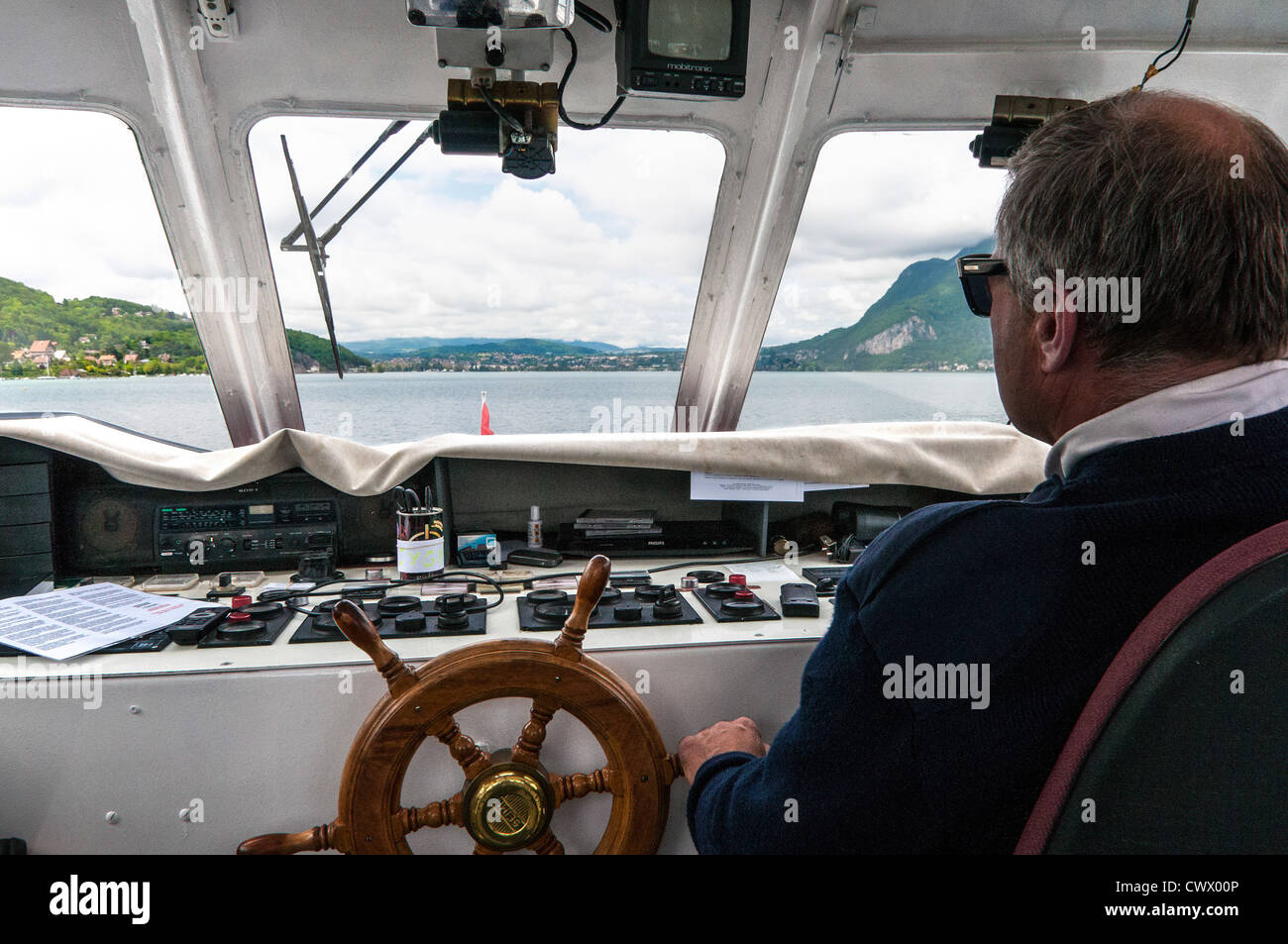 Captain steering hi-res stock photography and images - Alamy