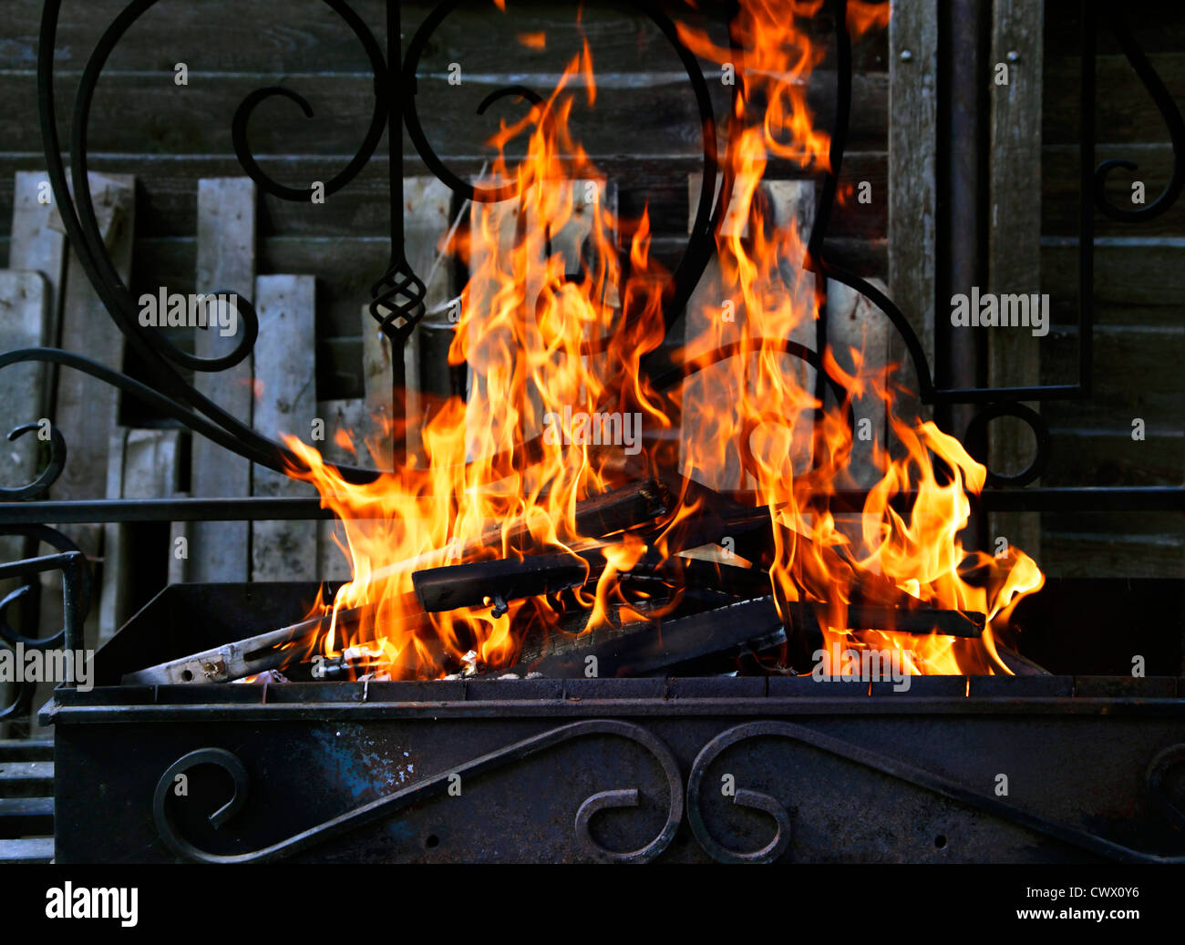 Fire with sparks in a old fireplace Stock Photo - Alamy