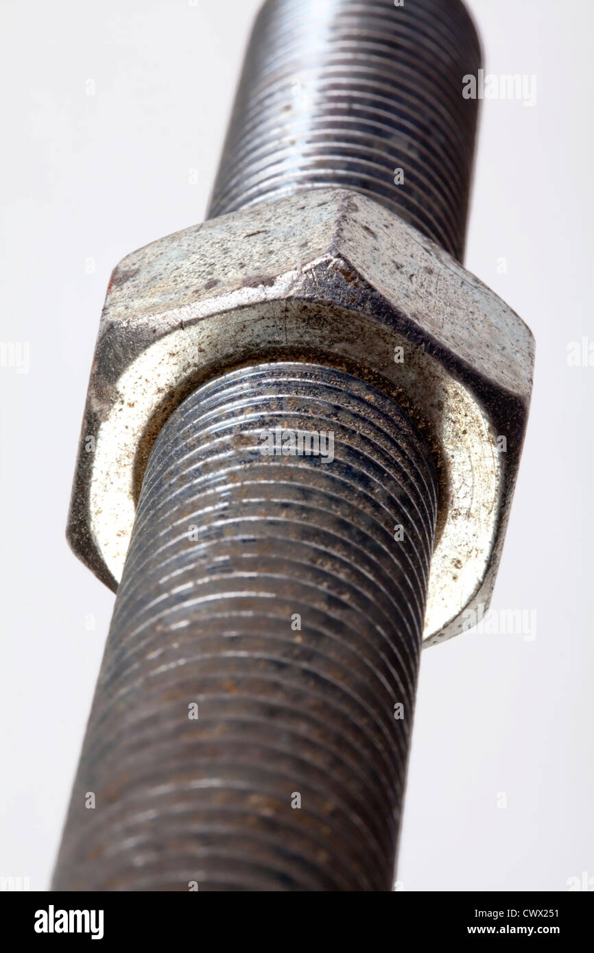 Thread of a screw with a nut Stock Photo - Alamy