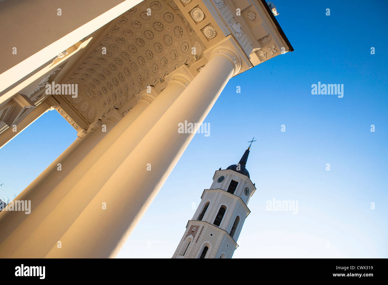 Pillars and tower against blue sky Stock Photo - Alamy
