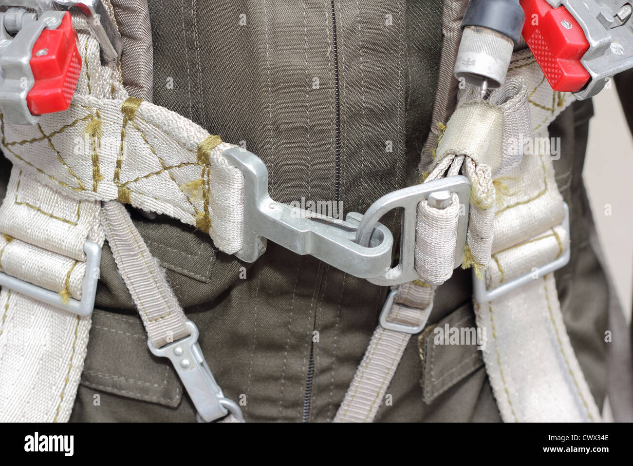 Clothing, harness military pilot in a green jumpsuit Stock Photo - Alamy