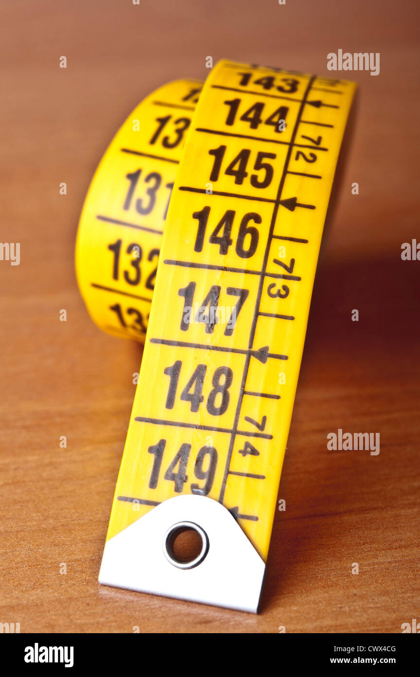 yellow tape measure Stock Photo - Alamy