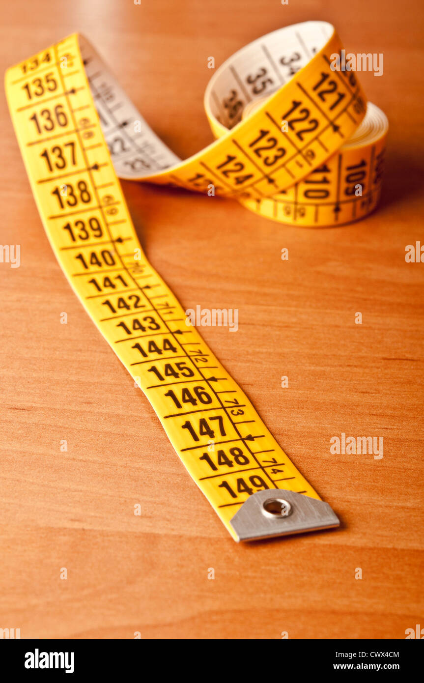 yellow tape measure Stock Photo - Alamy