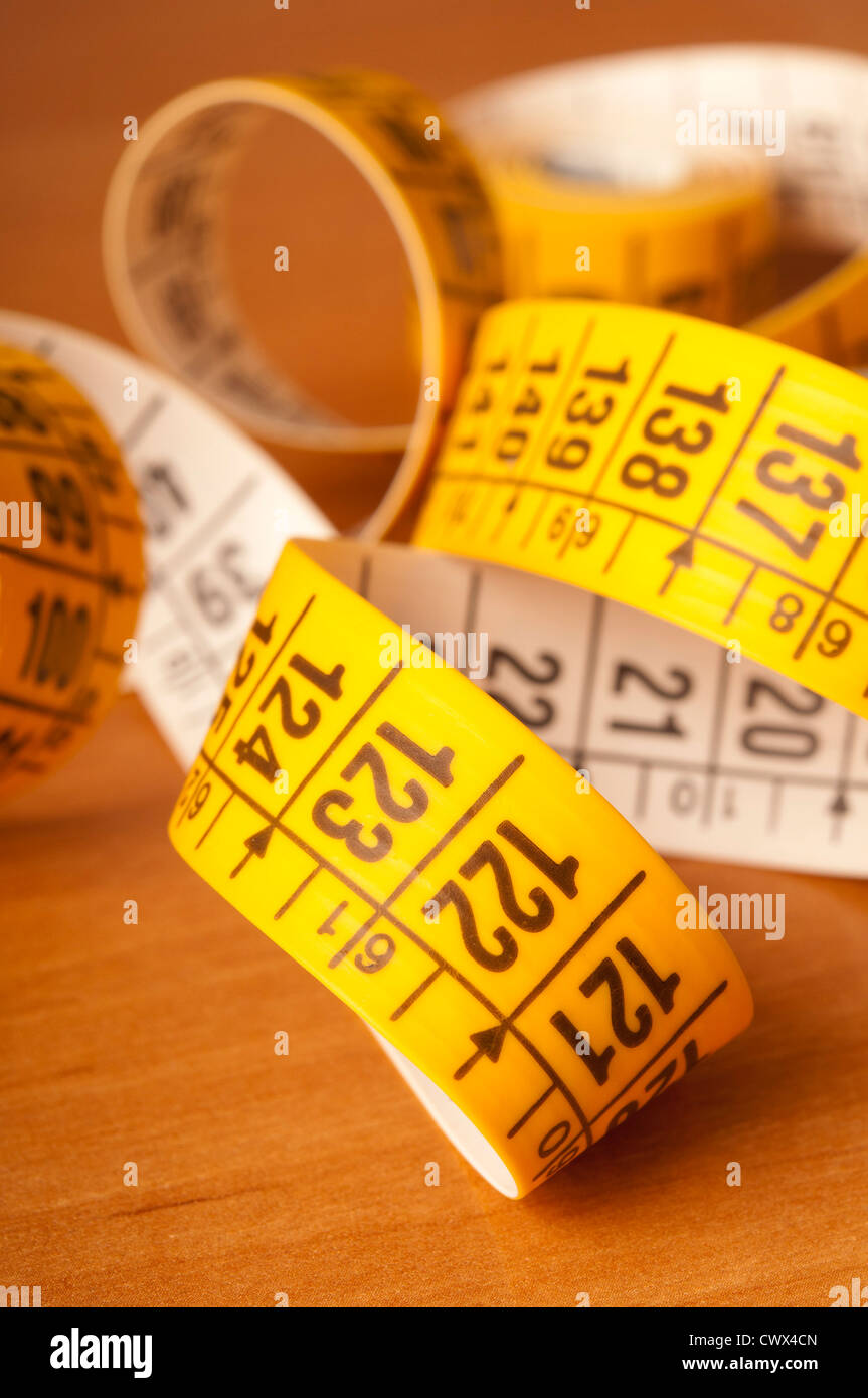 yellow tape measure Stock Photo - Alamy