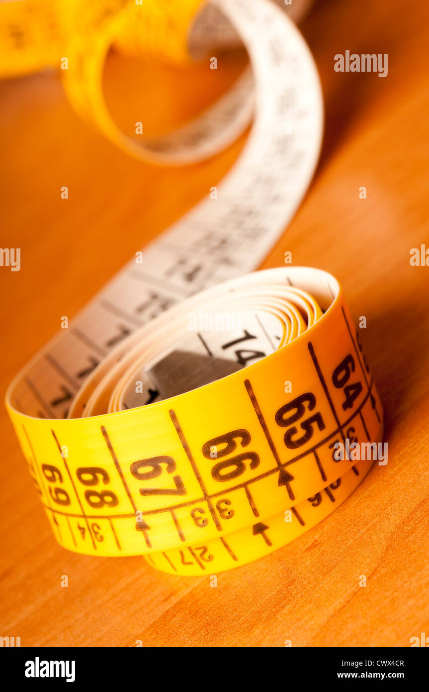 yellow tape measure Stock Photo - Alamy