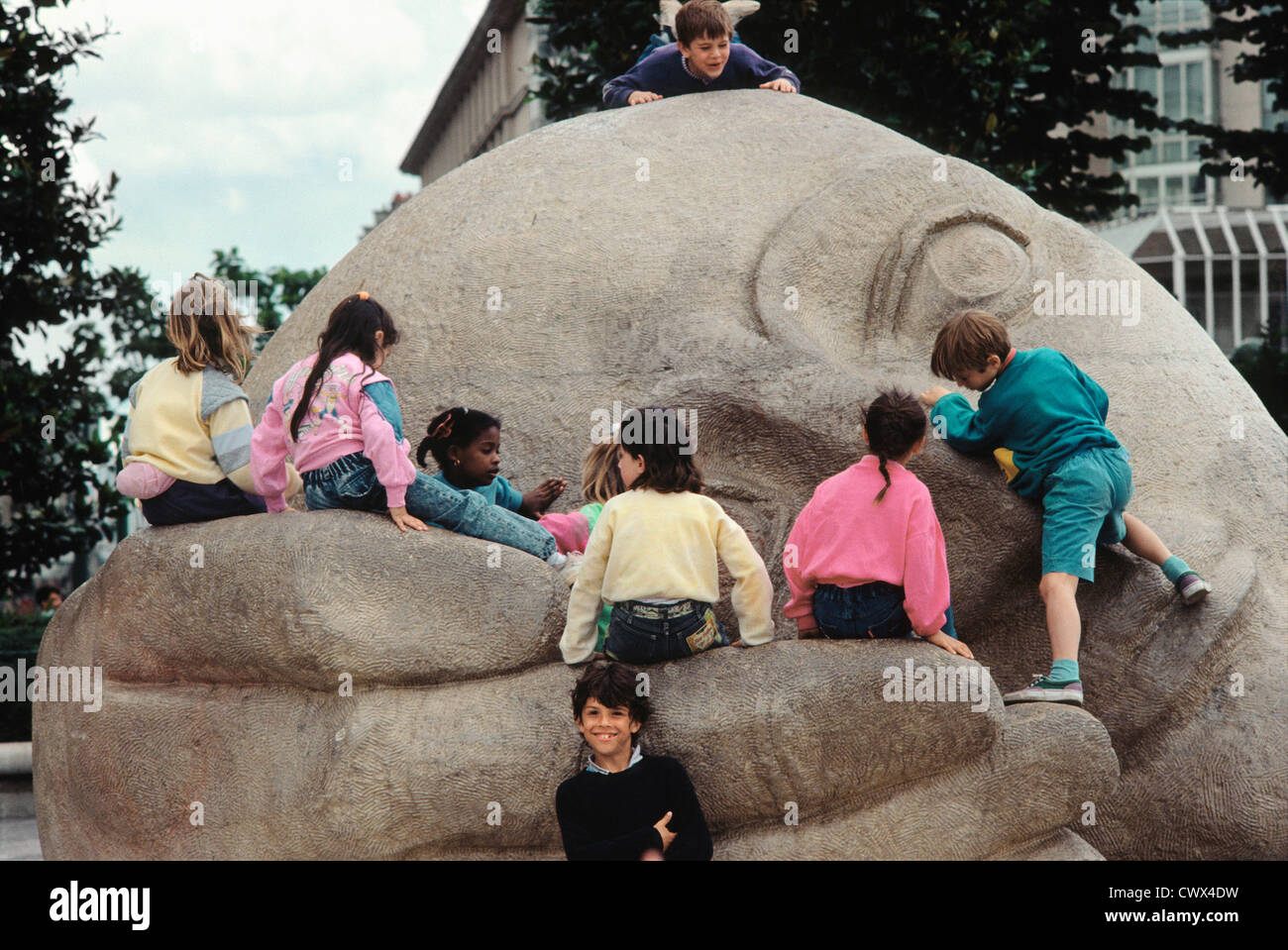 Children climbing on statue in Rouen, Normandy, France Stock Photo - Alamy
