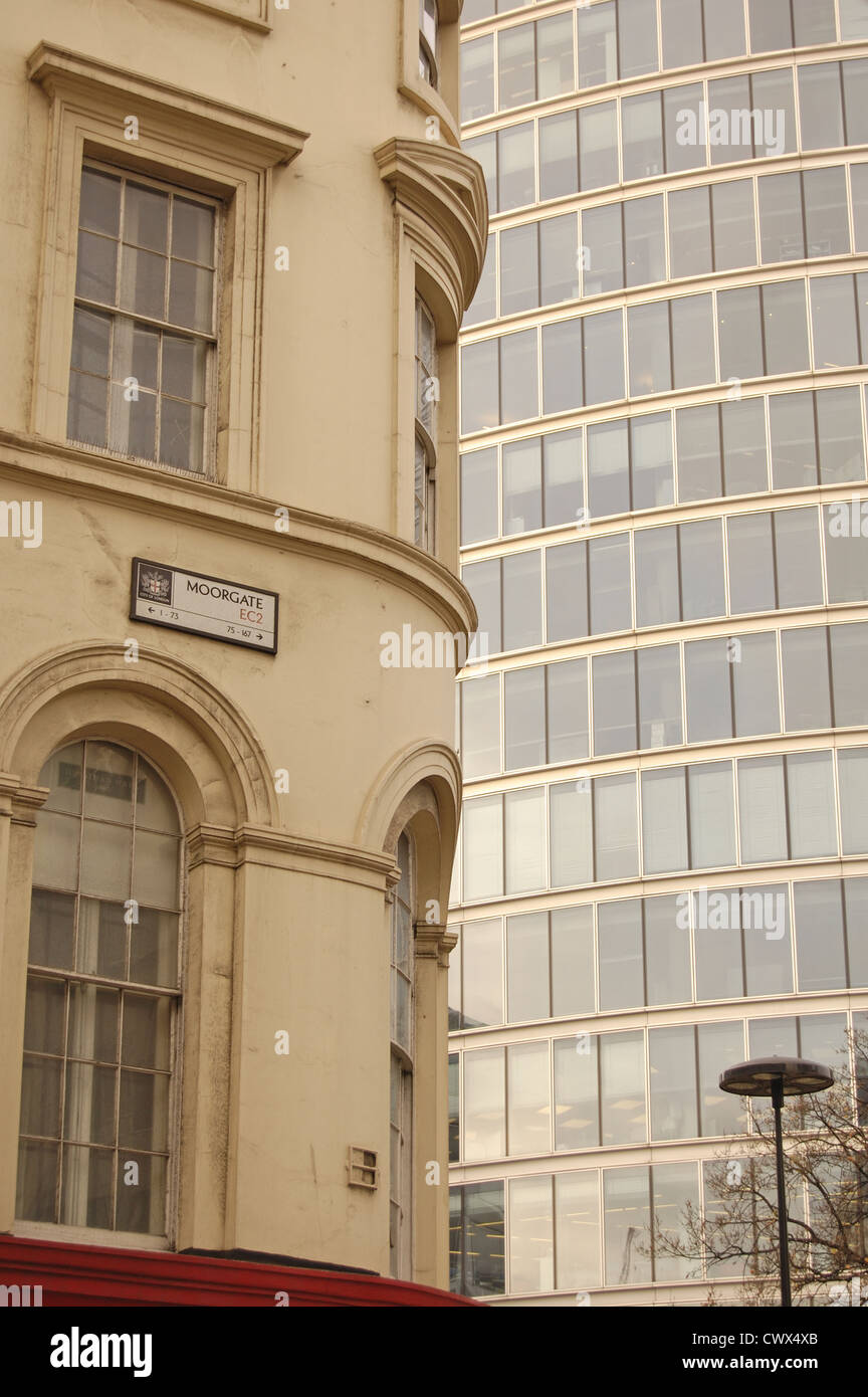 Modern office building and corner of traditional terrace in the City of ...