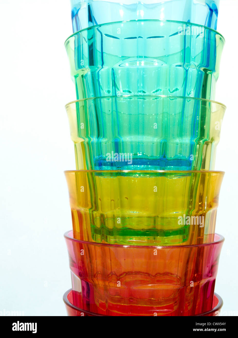 Brightly colored stacked plastic beakers Stock Photo - Alamy