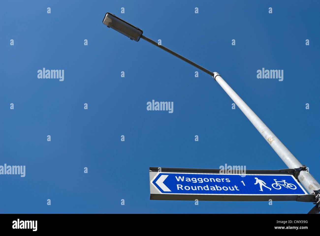 left pointing cycle and walking route sign, showing direction and ...