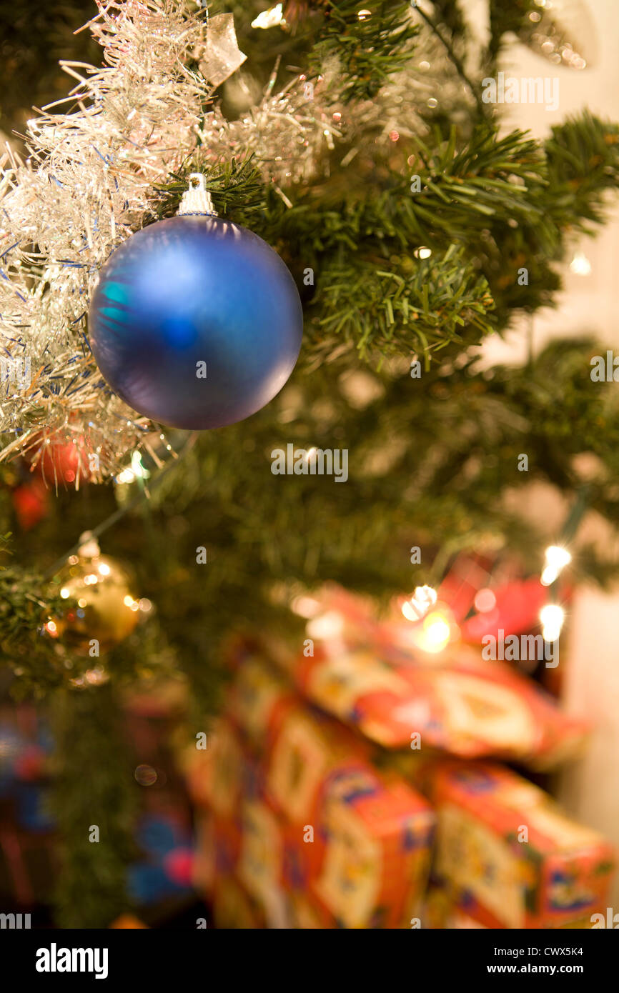 Blue Christmas ball in a tree Stock Photo - Alamy
