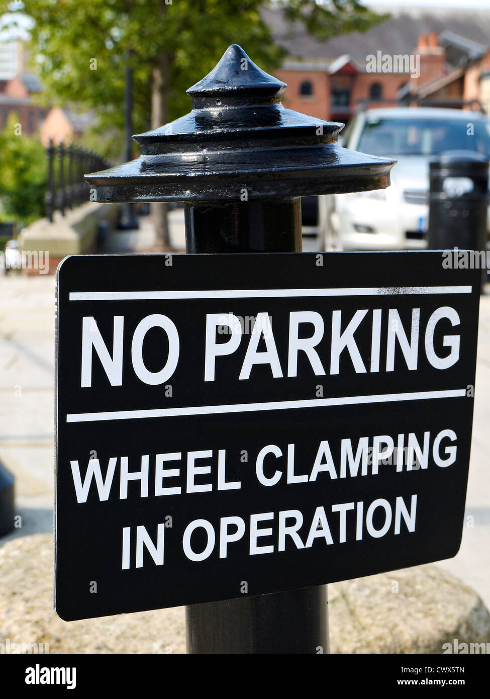 No Parking and wheel clamping warning sign UK Stock Photo - Alamy No Parking and wheel clamping warning sign UK Stock Photo - Alamy