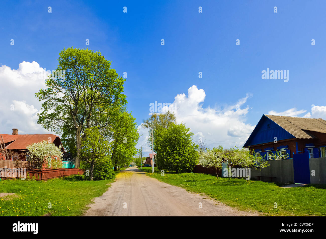 Farm Houses On The Rural Road in Belarus Stock Photo - Alamy