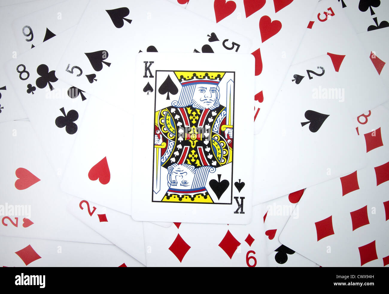 Card with playing cards background Stock Photo - Alamy