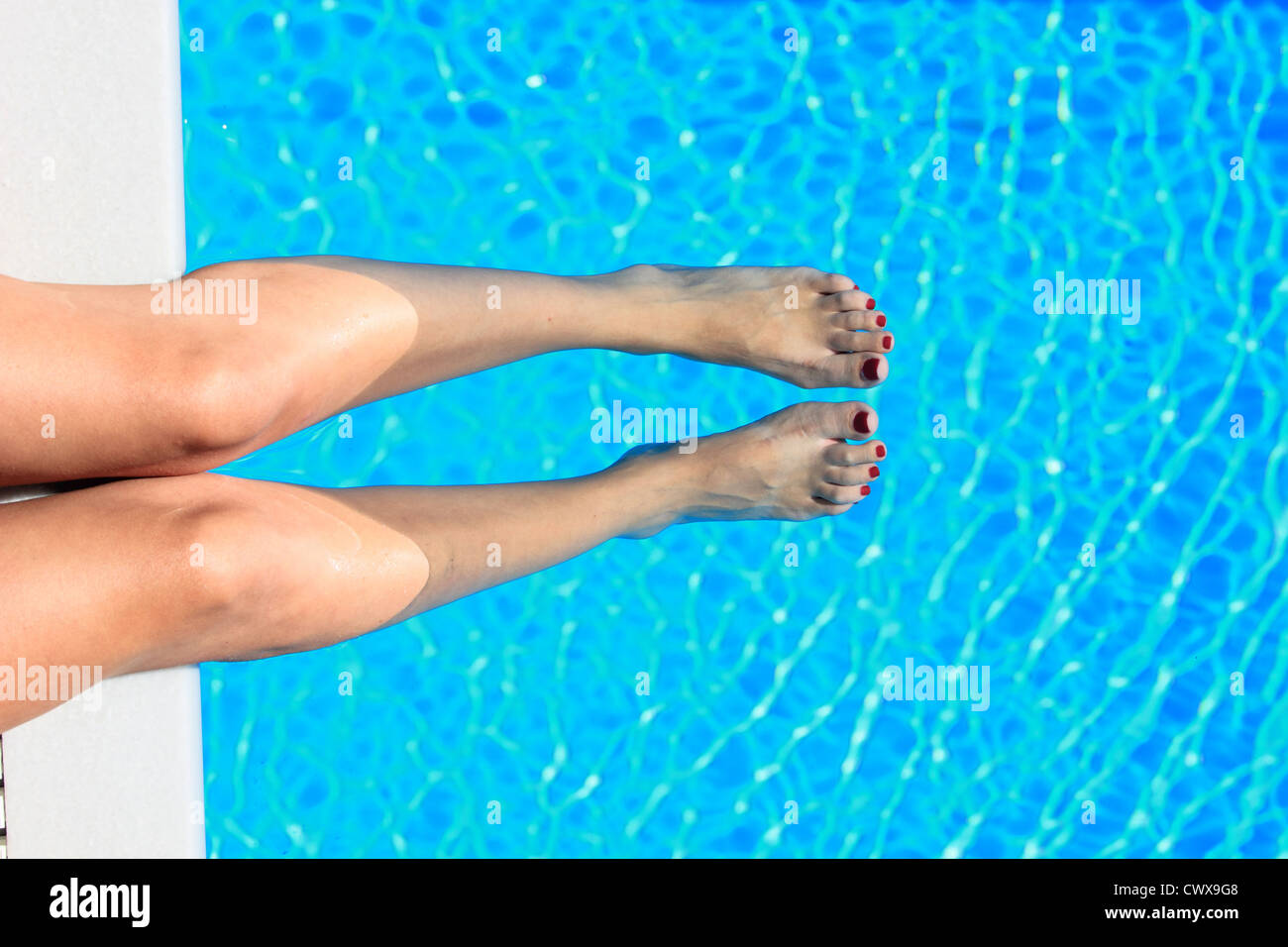 woman beauty legs in the swimming pool Stock Photo - Alamy