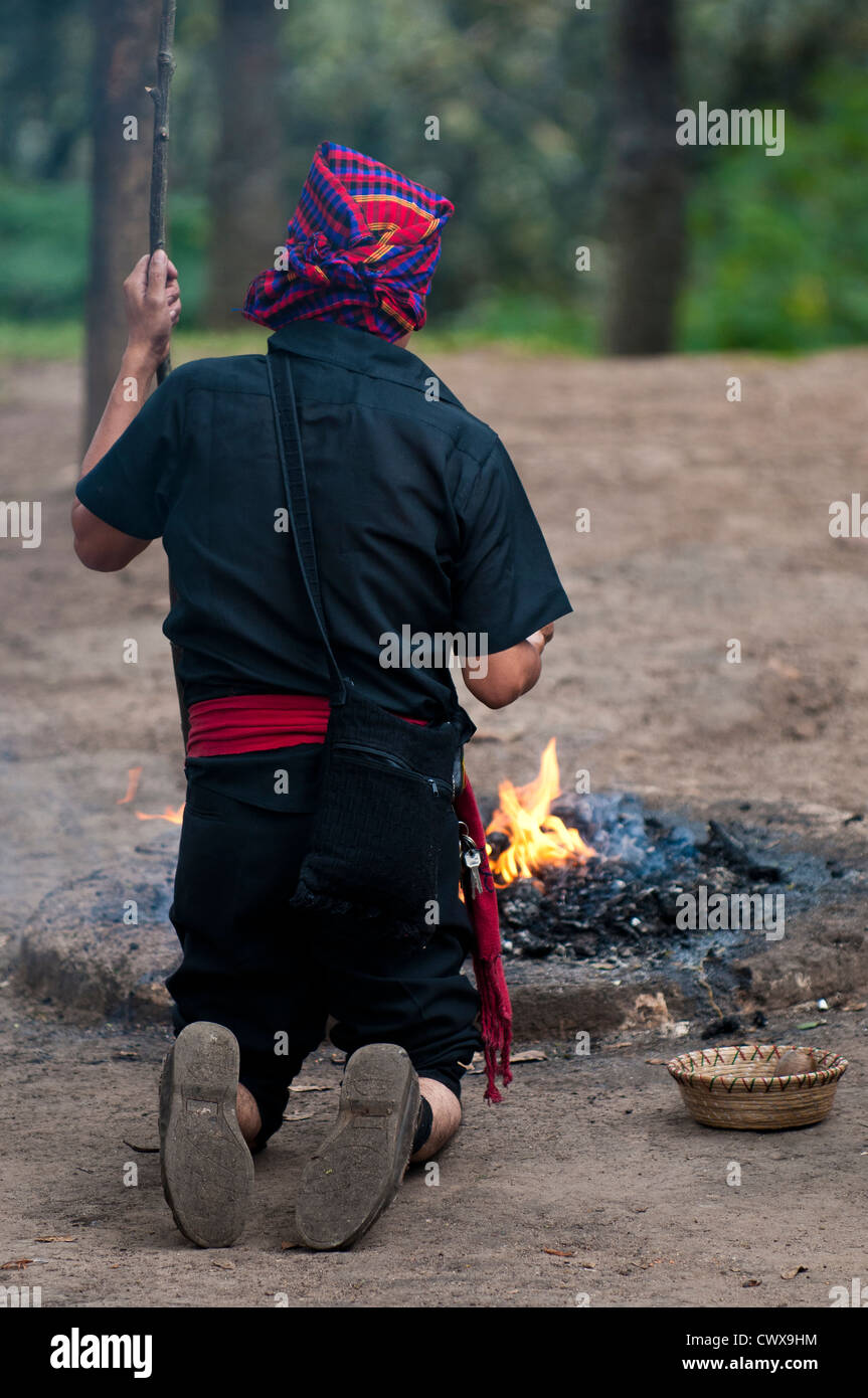A Mayan shaman performs a ceremony at Iximche Archeological National ...