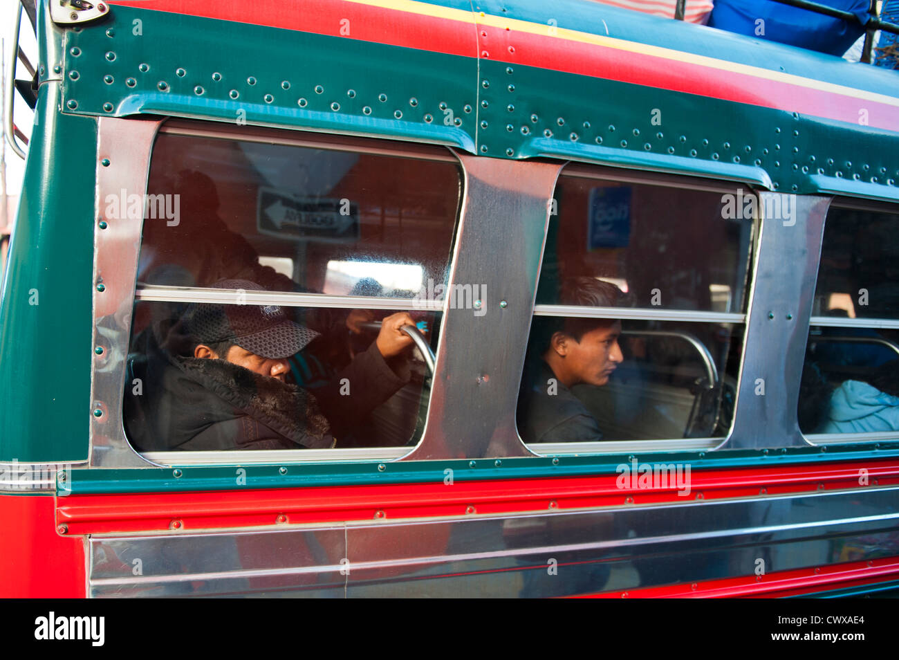 Guatemala, Chichicastenango. People riding chicken bus Stock Photo - Alamy