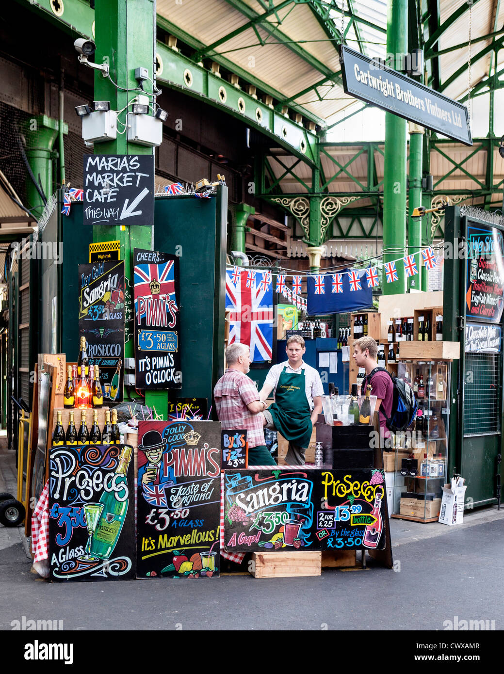 The Cartwright Bothers - A market stall selling wine at the Borough ...