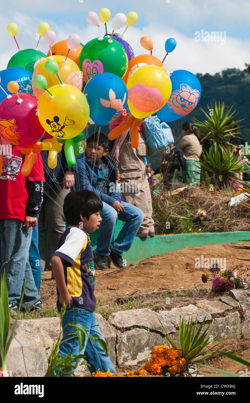 Young boy with balloons, Day Of The Dead, Dia de los Muertos, ceremony ...