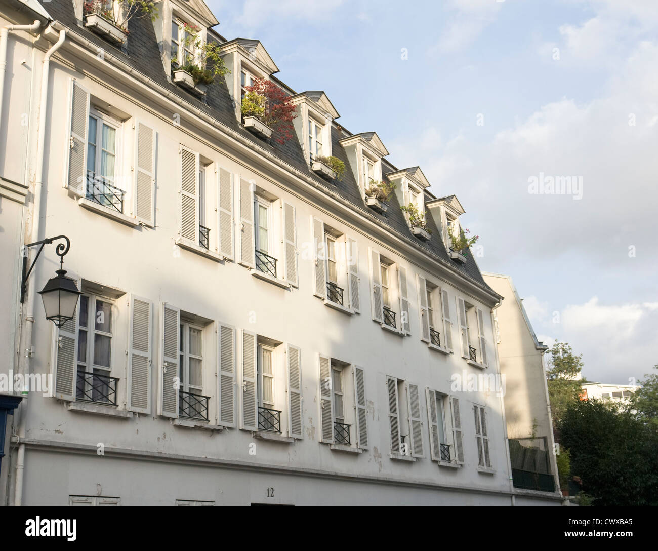 Ancient building with roof windows, Montmartre, Paris Stock Photo - Alamy