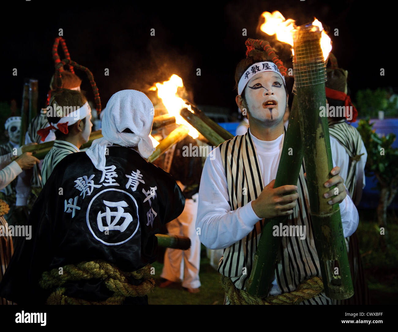 Group of people with torches hi-res stock photography and images - Alamy
