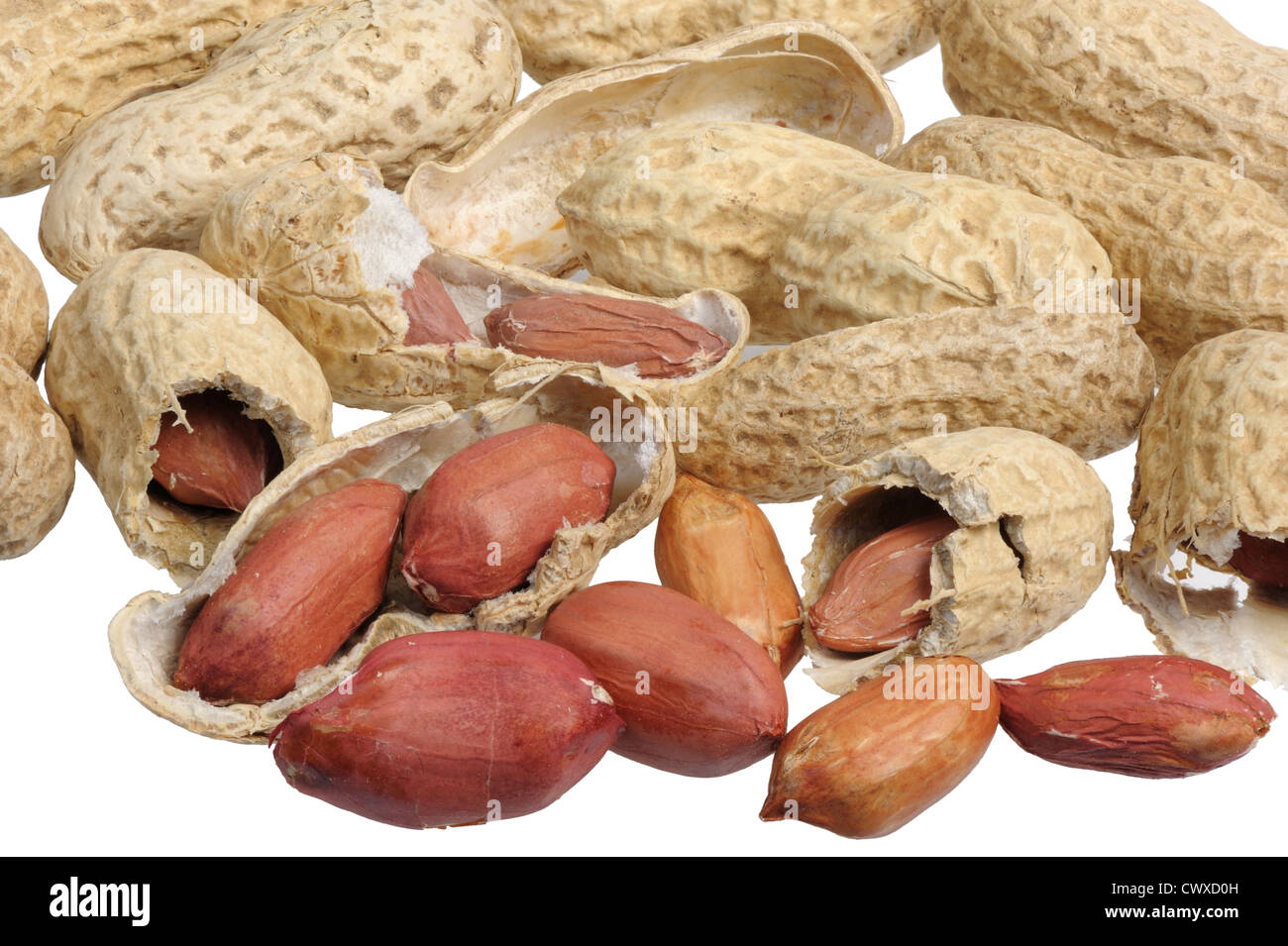 Handful of peanuts on a white background, isolated Stock Photo - Alamy