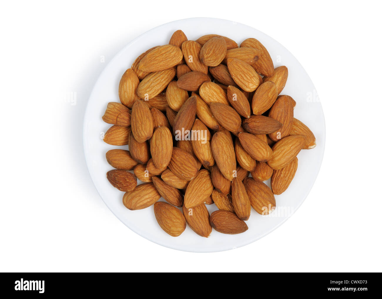 Almonds in a plate on white background, isolated Stock Photo - Alamy