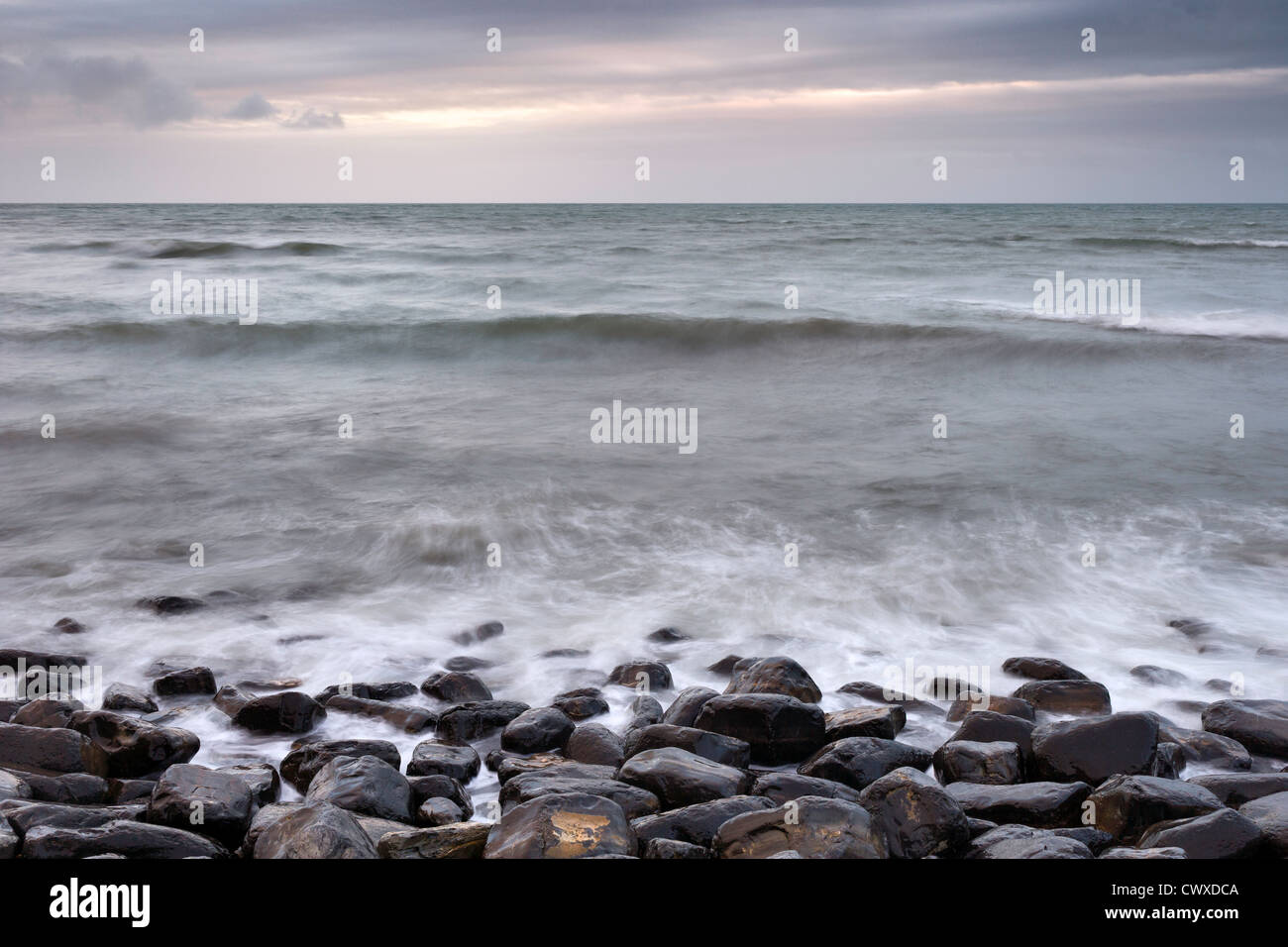 A seascape on the Dorset coast with a lovely subtle sunset on the ...