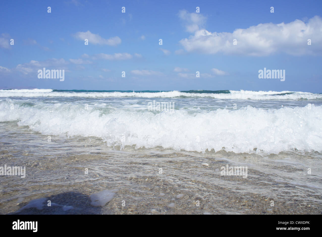 Shallow waves in Crete Stock Photo - Alamy