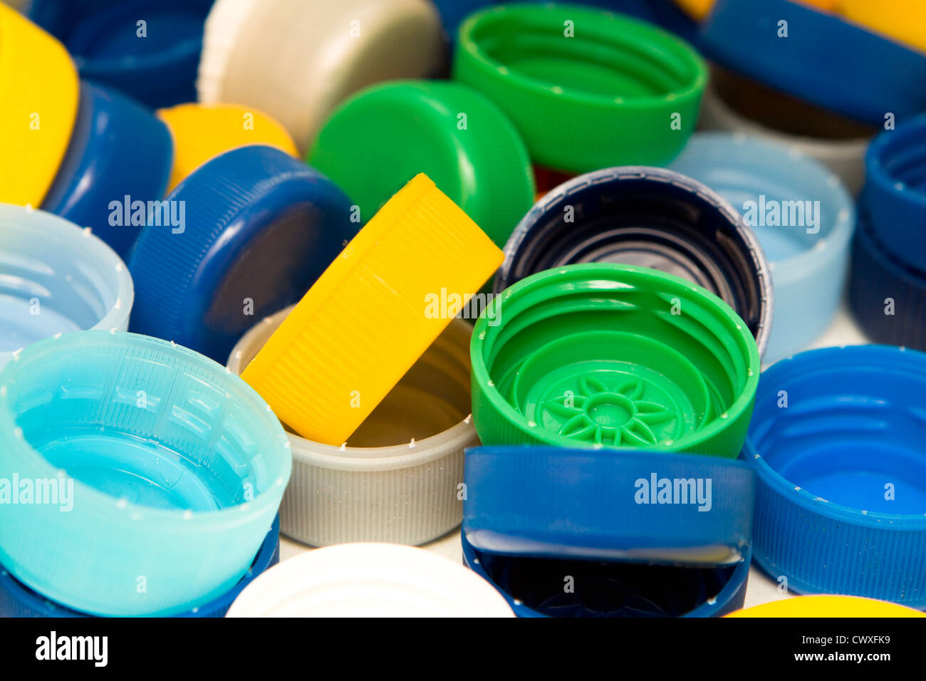Lots of colorful plastic caps. Shot in studio Stock Photo - Alamy