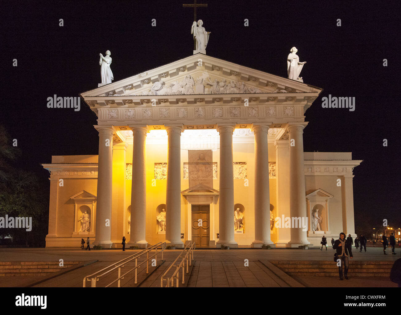 The Roman Catholic Vilnius Cathedral at night, Lithuania, with statues ...
