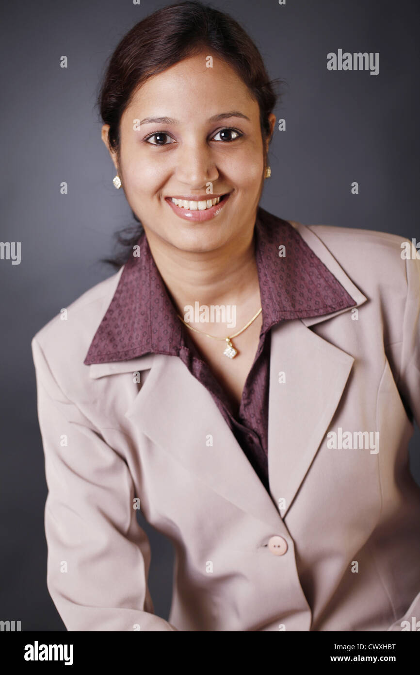Portrait of young happy Indian business woman Stock Photo - Alamy Portrait of young happy Indian business woman Stock Photo - Alamy