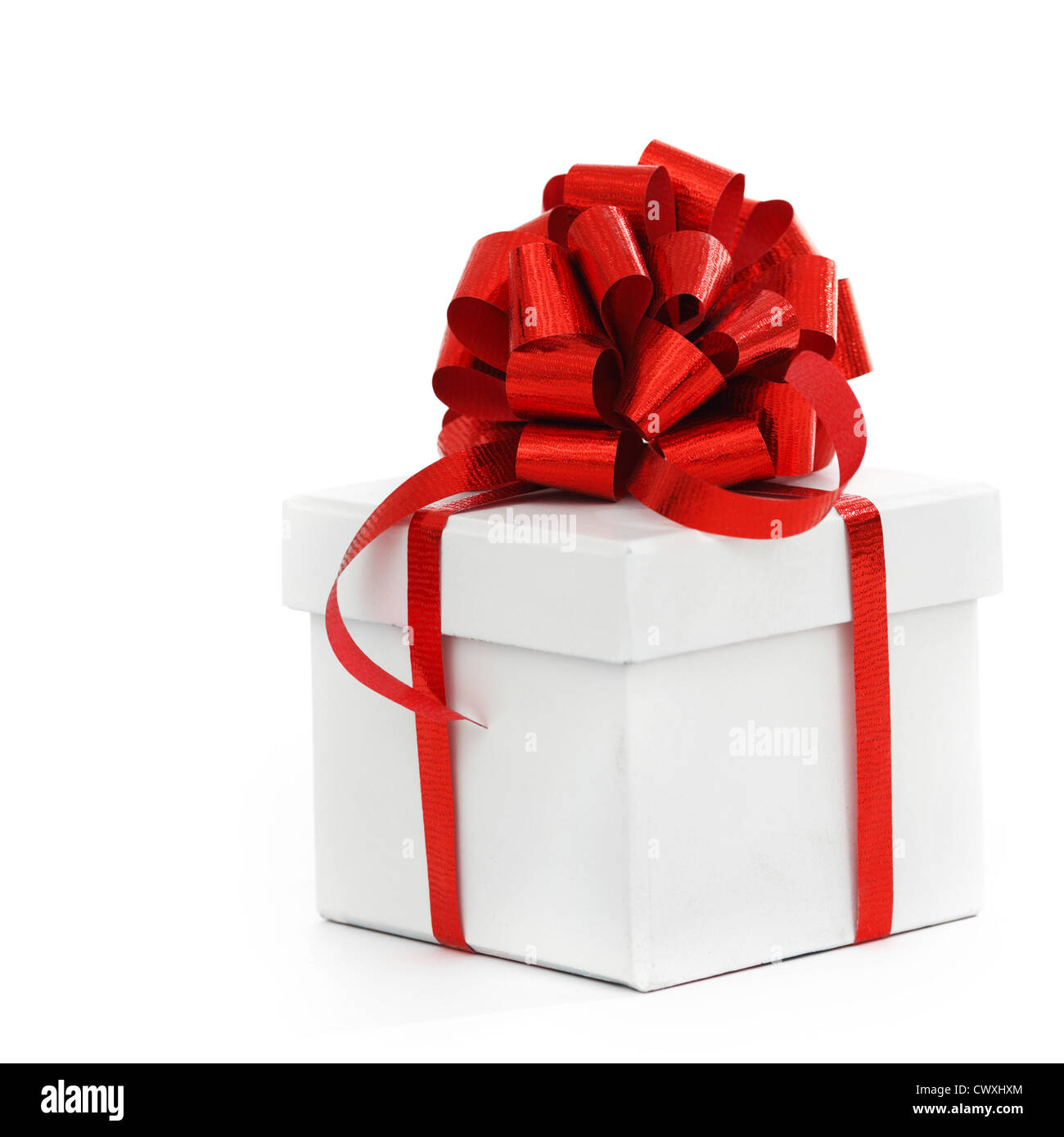 white christmas gift with red ribbon Stock Photo - Alamy