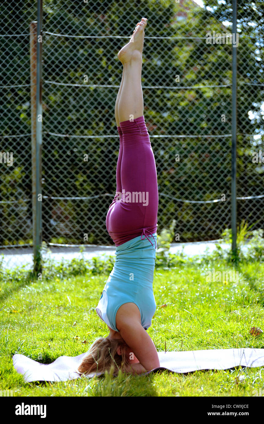 Girl head standing in a park Stock Photo - Alamy