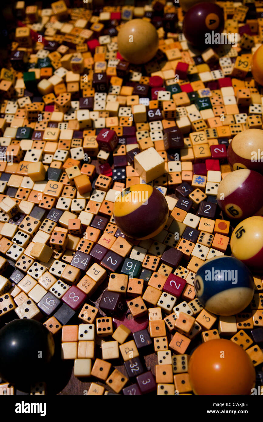 Dice and billiard balls. Still life, frame full of various types of ...