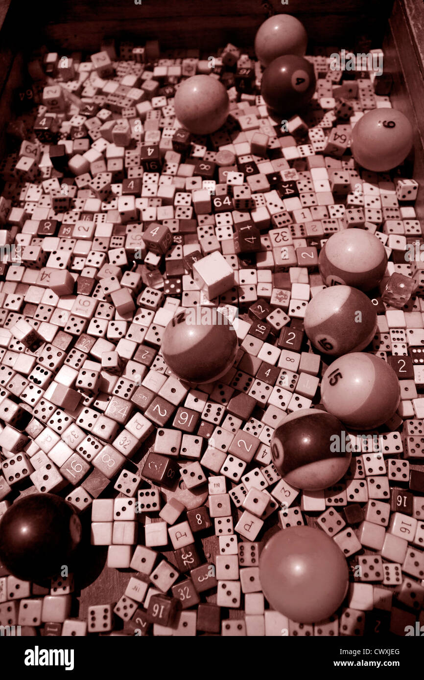 Dice and billiard balls. Still life, frame full of various types of ...