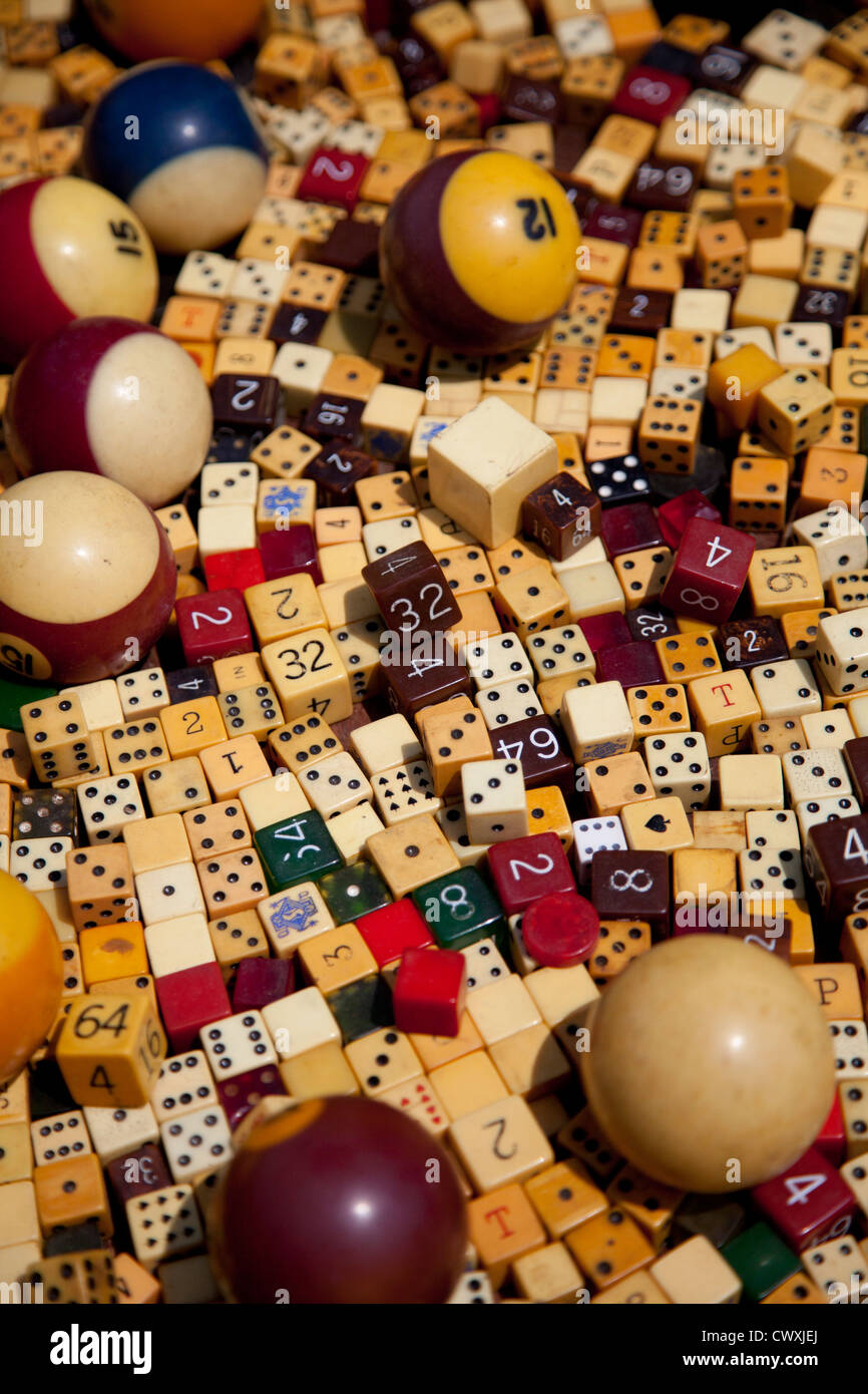 Dice and billiard balls. Still life, frame full of various types of ...