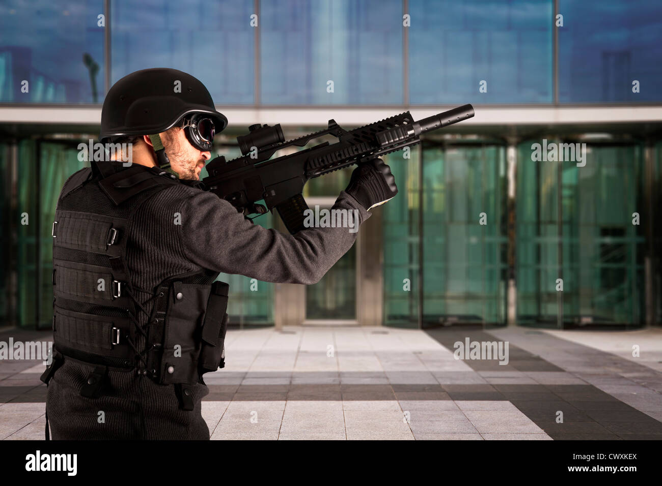Military defending a business building Stock Photo - Alamy