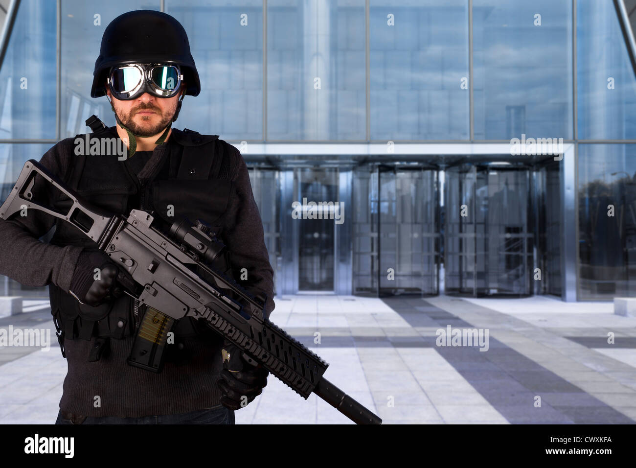 Military defending a business building Stock Photo - Alamy